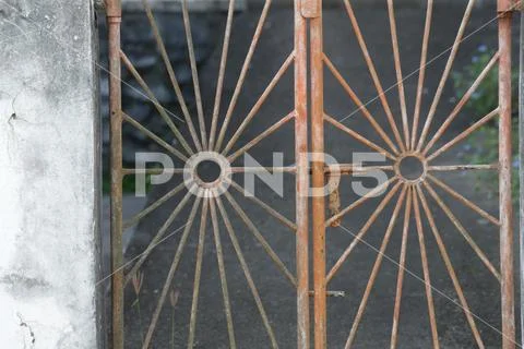 Grid of a gate of a residence Stock Image ~ #249472086