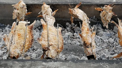 Grilled Pomegranate fish with salt. Cook... | Stock Video | Pond5