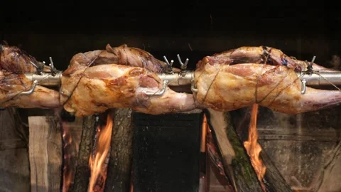 Grilled roasted mutton meat on spit at s... | Stock Video | Pond5