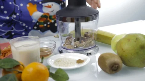 grinding walnut in a blender. cooking he... | Stock Video | Pond5