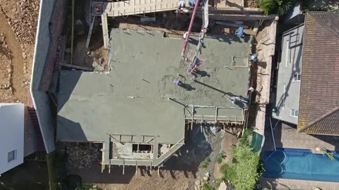 The ground floor slab of a house is cast... | Stock Video | Pond5
