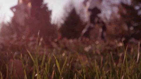 Ground view of girls running in backgrou... | Stock Video | Pond5