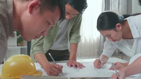 Group Of Asian Engineers Helping Each Ot... | Stock Video | Pond5