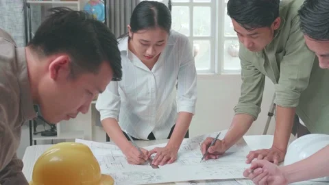 Group Of Asian Engineers Helping Each Ot... | Stock Video | Pond5