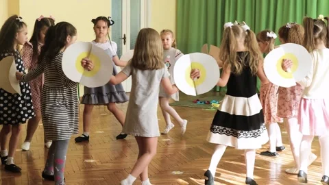 Group of children dancing with paper sun... | Stock Video | Pond5