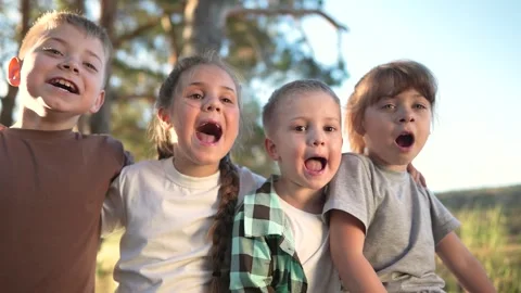 a group of children shouting and rejoici... | Stock Video | Pond5