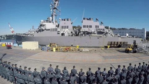 Group of crew members stand in front of ... | Stock Video | Pond5