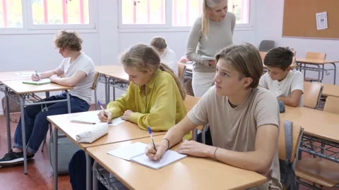 Group of diligent school kids and teache... | Stock Video | Pond5