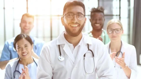 Diverse Group Of Doctors Stock Footage ~ Royalty Free Stock Videos | Pond5