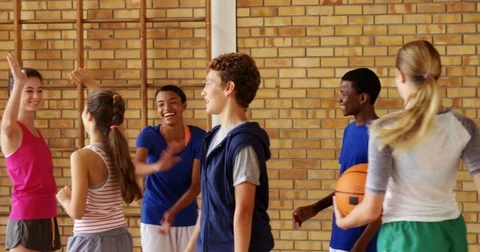 Group of happy high school kids giving h... | Stock Video | Pond5