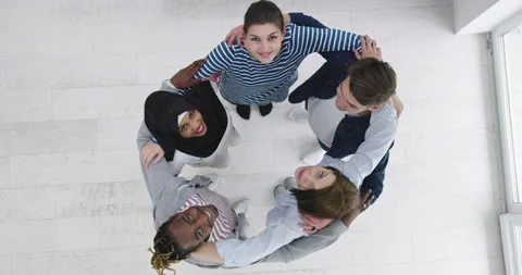 Group of happy young students showing un... | Stock Video | Pond5
