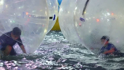 Group of kids playing in giant inflated ... | Stock Video | Pond5