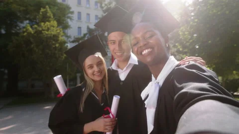 Group of multiracial students graduates ... | Stock Video | Pond5