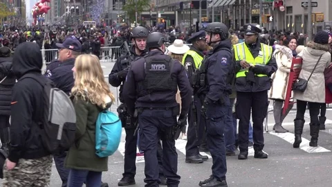 Group of NYPD officers with crowd of peo... | Stock Video | Pond5
