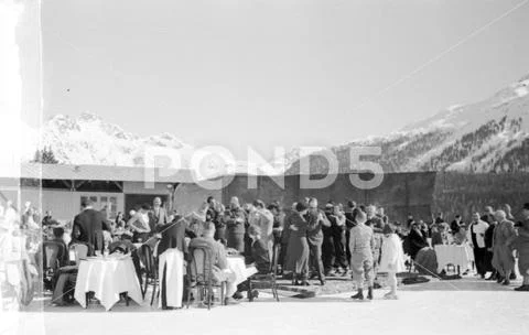 A group of people dancing during the filming of a movie by Terra Film ...