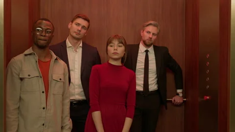 Group of people in the elevator, giving ... | Stock Video | Pond5