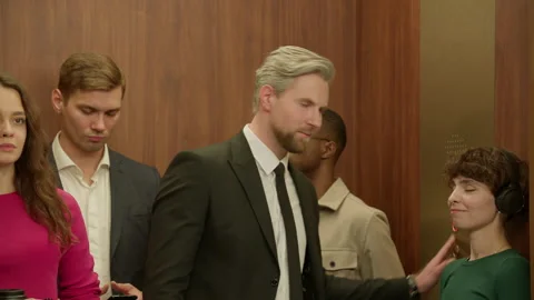 Group of people in the elevator, going t... | Stock Video | Pond5