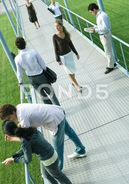 Group of people involved in different activities on walkway ~ Hi Res ...