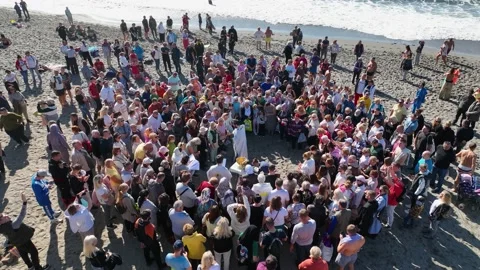 A group of people perform a baptism cere... | Stock Video | Pond5
