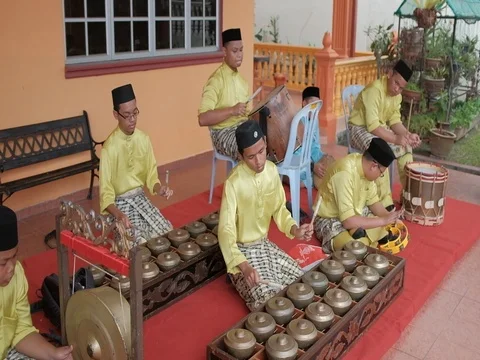 A group of people playing Cak Lempong in... | Stock Video | Pond5