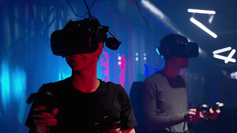 Group of people playing VR games in a st... | Stock Video | Pond5