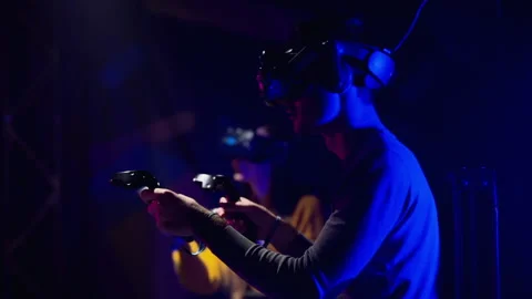 Group of people playing VR games in a st... | Stock Video | Pond5