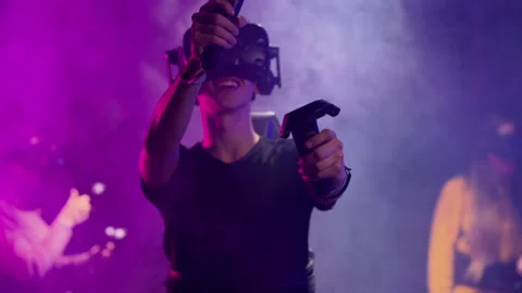 Group of people playing VR games in a st... | Stock Video | Pond5