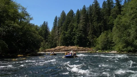 Group of People on Raft Floating Down Ri... | Stock Video | Pond5