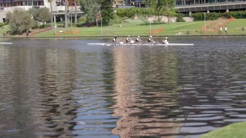 Group of People Rowing a Row Boat in the... | Stock Video | Pond5