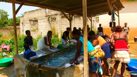 A group of poor African women wash cloth... | Stock Video | Pond5
