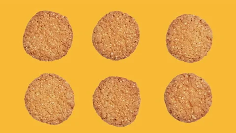 Group of six oatmeal cookies rotating at... | Stock Video | Pond5