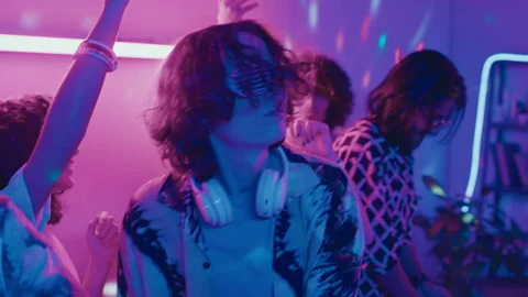 Group of Students Dancing in Neon Lights... | Stock Video | Pond5