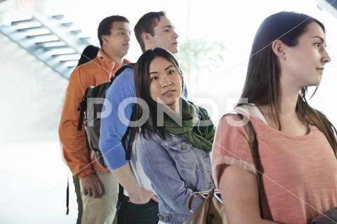 Group of students standing in line at college campus ~ Premium Photo ...