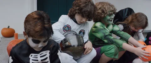 Group of trick-or-treating kids talking ... | Stock Video | Pond5