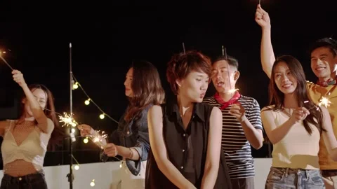 Group of young Asian friends lit light s... | Stock Video | Pond5