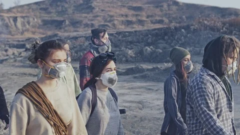 Group of young exhausted people in gas m... | Stock Video | Pond5