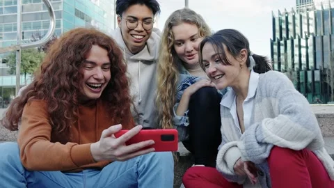 Group of young gen z friends sitting tog... | Stock Video | Pond5