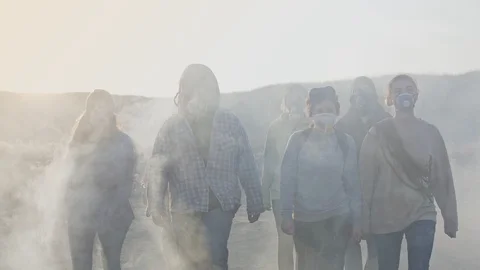 Group of young people in gas mask going ... | Stock Video | Pond5