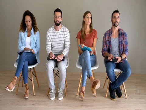 Group of young people in waiting for an ... | Stock Video | Pond5