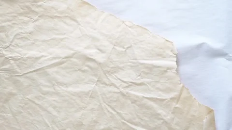 Grunge crumpled paper pieces on white ba... | Stock Video | Pond5