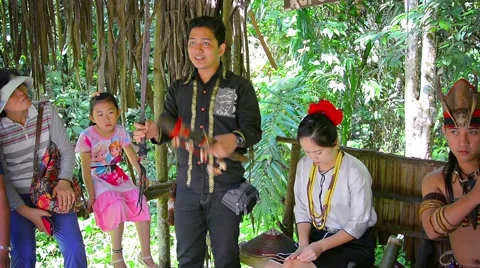 guide shows a traditional, native sword | Stock Video | Pond5