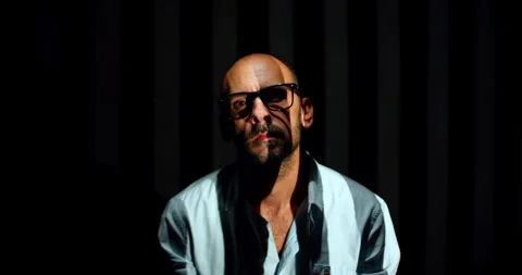 Guilty look of a handcuffed person in co... | Stock Video | Pond5