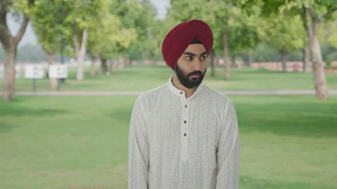 Guilty Sikh Indian man hiding his face i... | Stock Video | Pond5