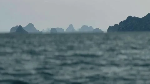 Gulf of Oman horizon, Island at sunset i... | Stock Video | Pond5