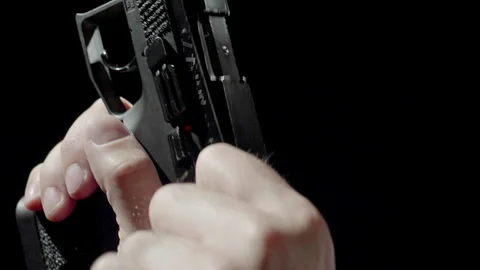 Pulling Gun Stock Footage ~ Royalty Free Stock Videos | Pond5