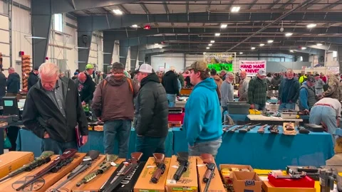 Gun Show - Crowd of People Looking at Gu... | Stock Video | Pond5