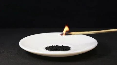 Gunpowder. Burning black powder in a cup... | Stock Video | Pond5