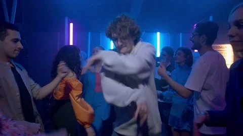 The guy is actively dancing on the dance... | Stock Video | Pond5
