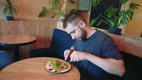 Guy Eats Stock Videos – Royalty-Free HD & 4K Videos | Pond5