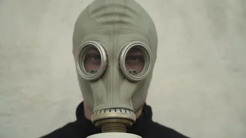 The guy in the gas mask. on a white back... | Stock Video | Pond5